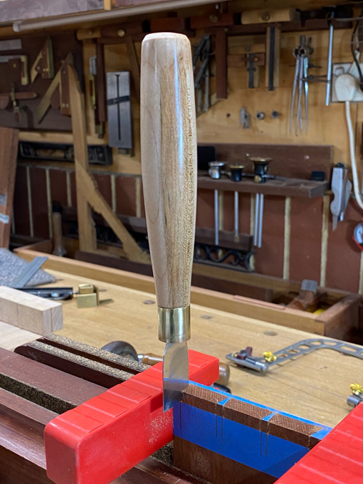 Tapthe blade into the kerf, to full depth, moving towards the ...